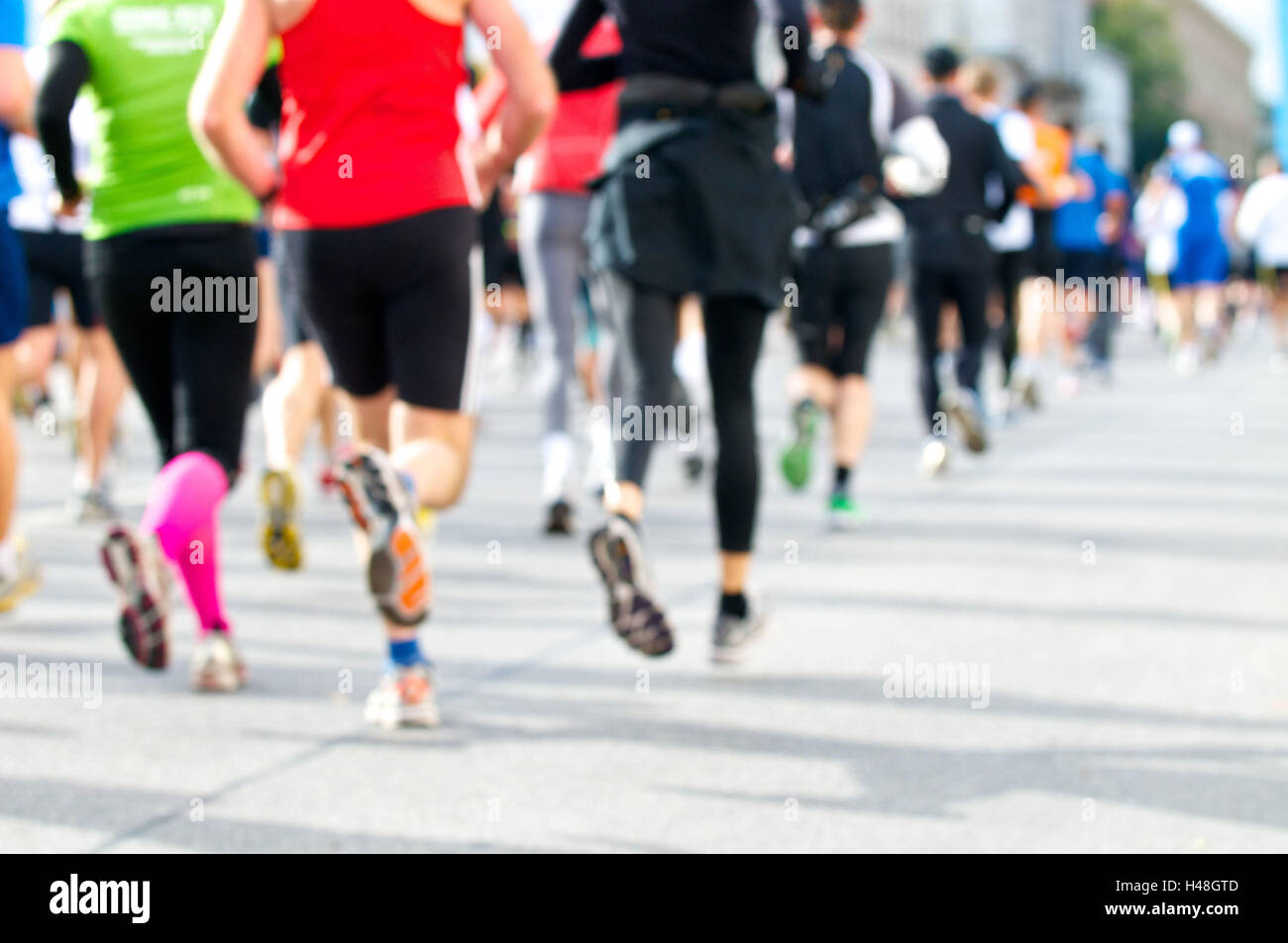 Legs of marathon runners Stock Photo - Alamy