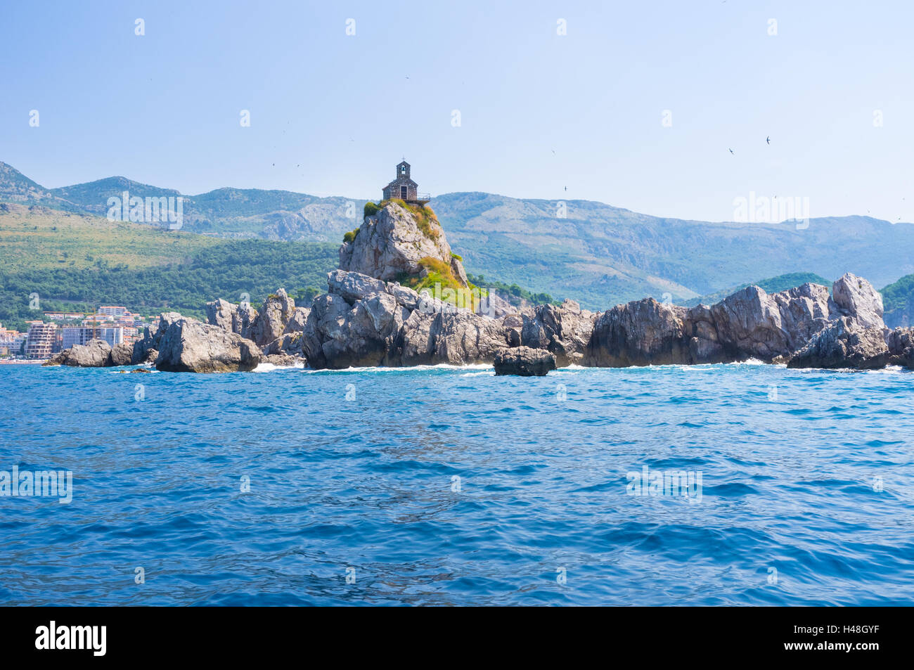 The Mali Katic island surrounded by by sharp rocks, making it ...