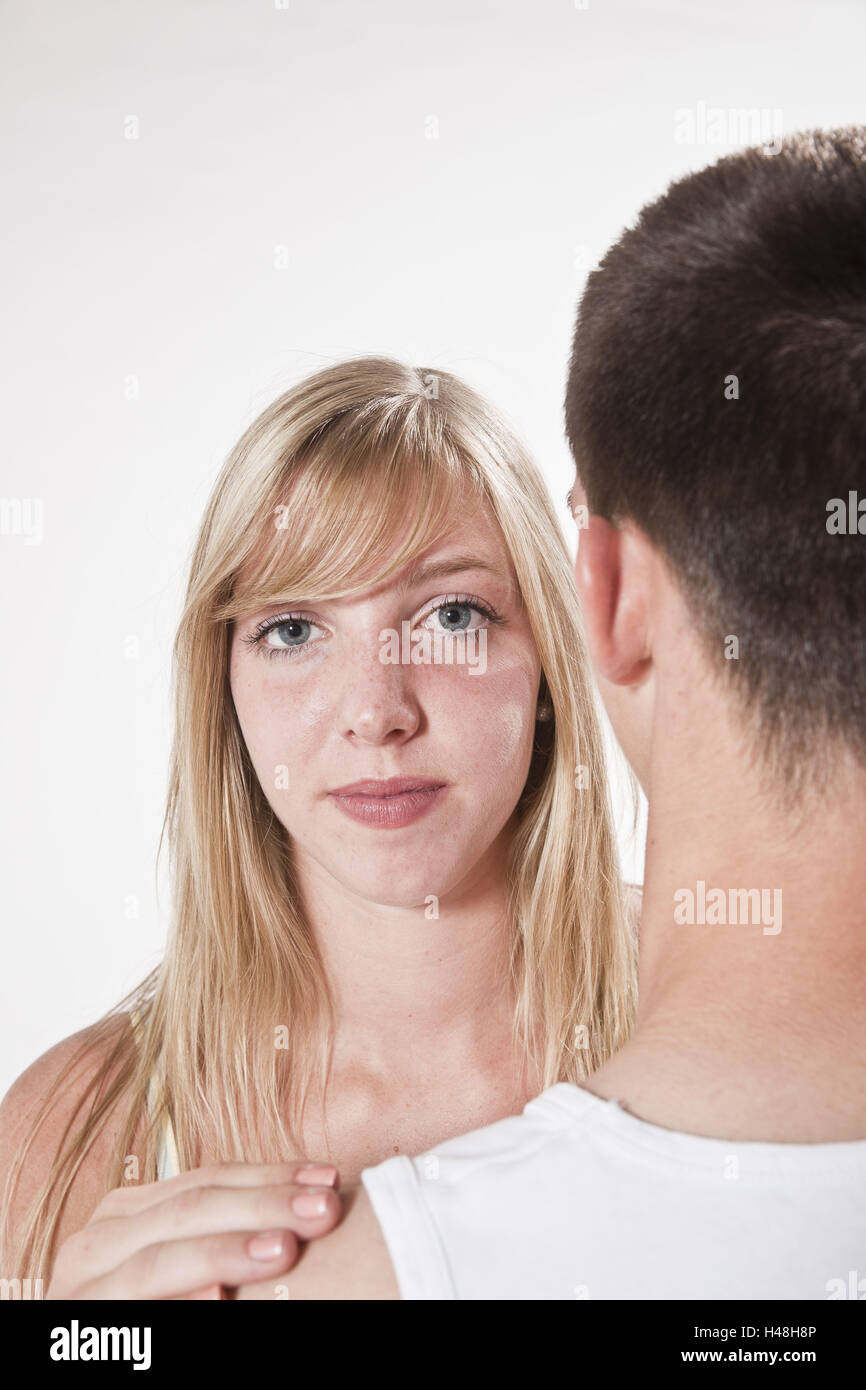 Young couple is confronted, portrait, curled Stock Photo - Alamy