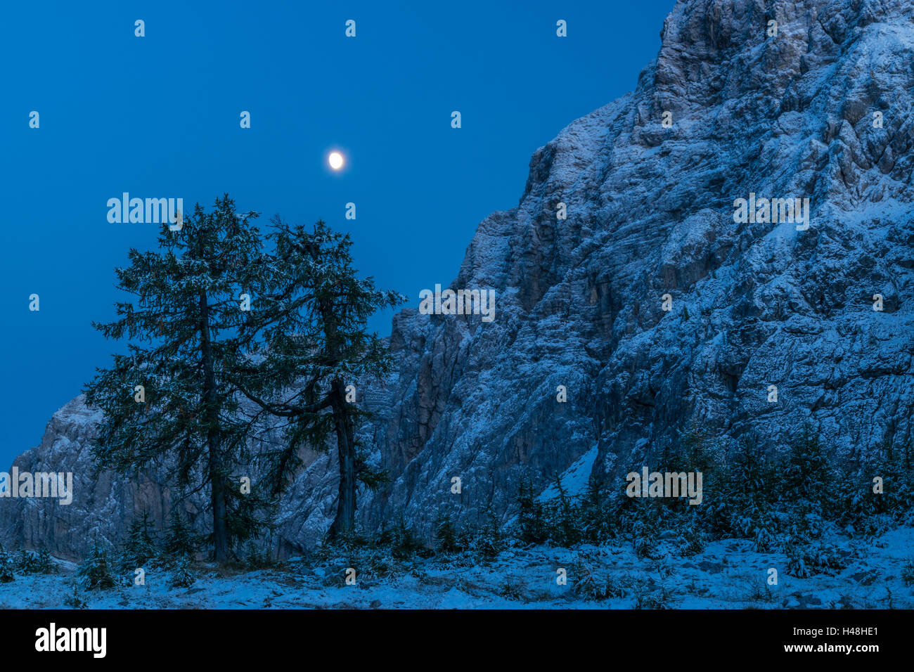 Mountain view with full moon Stock Photo - Alamy