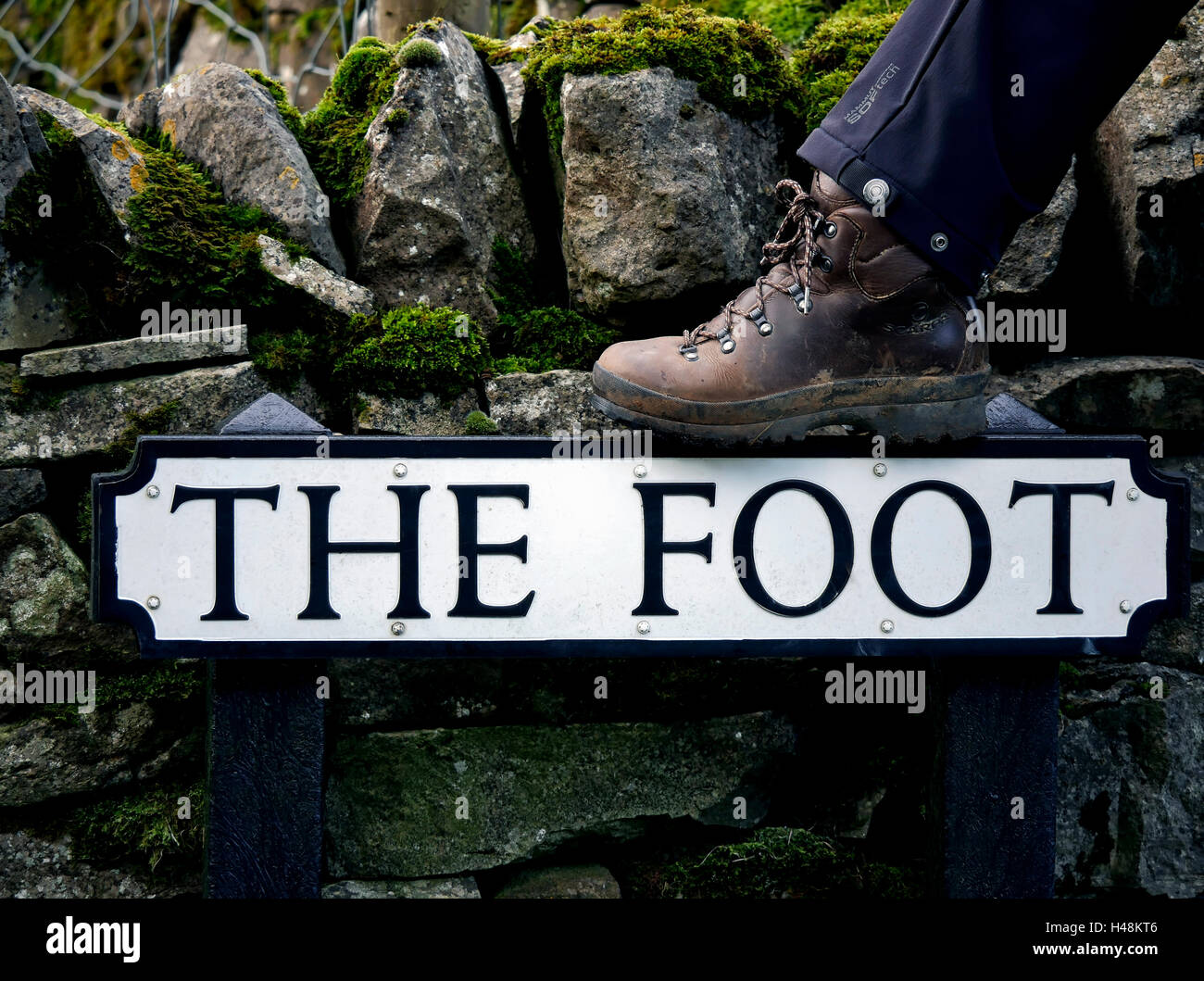 The Foot signpost in Tissington with a walkers leather boot on top Peak ...