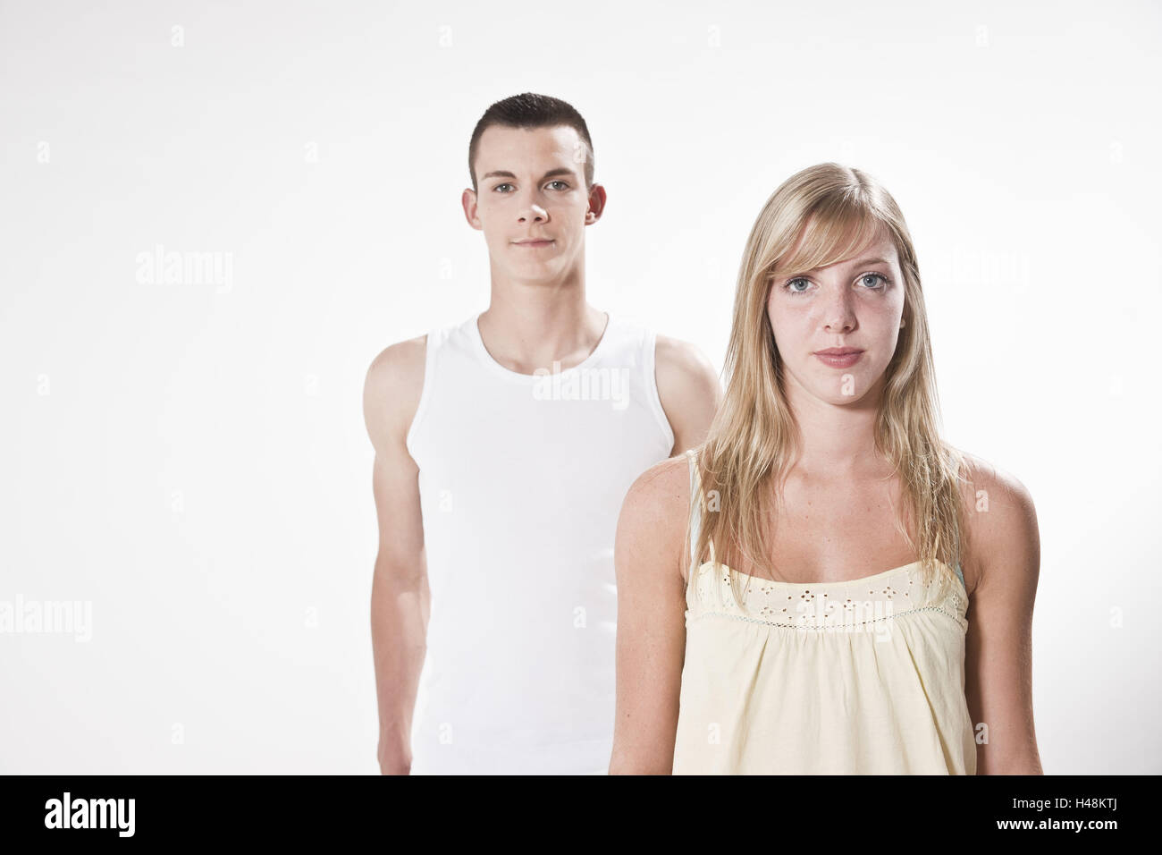 Man stand behind woman hi-res stock photography and images - Alamy