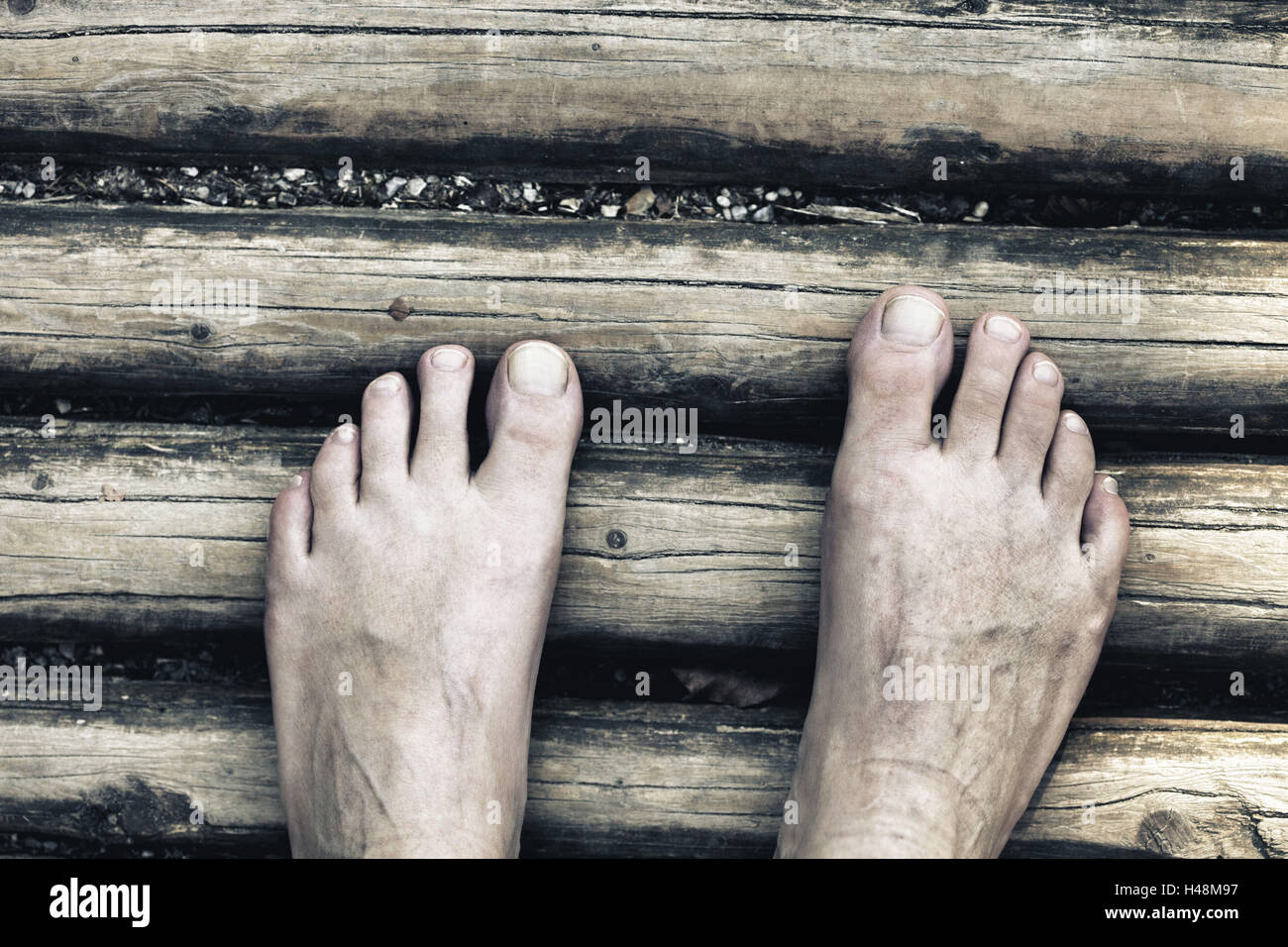 Feet on barefoot path, planks Stock Photo - Alamy