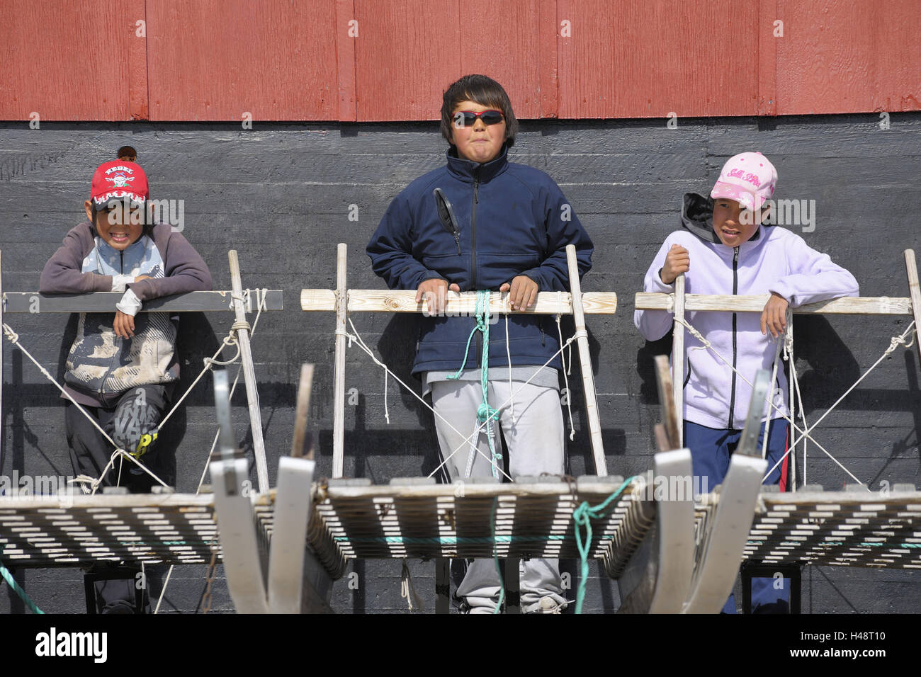 Greenland, children on scaffolding Stock Photo - Alamy