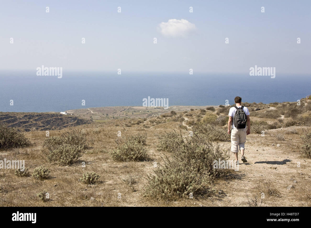 Greece, the Cyclades, Santorin, island Thirassia, wanderer, back view ...