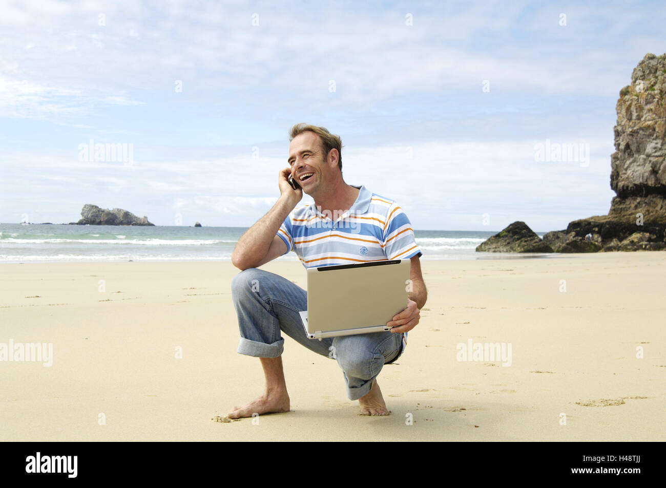 Beach, man, smile, mobile phone, call up, laptop, squat, person, sandy ...