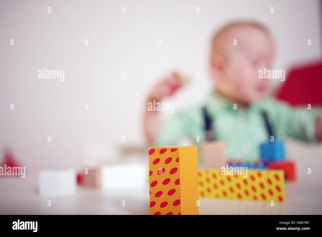 Timber-frame construction stones, background, infant, boy, play, blur ...