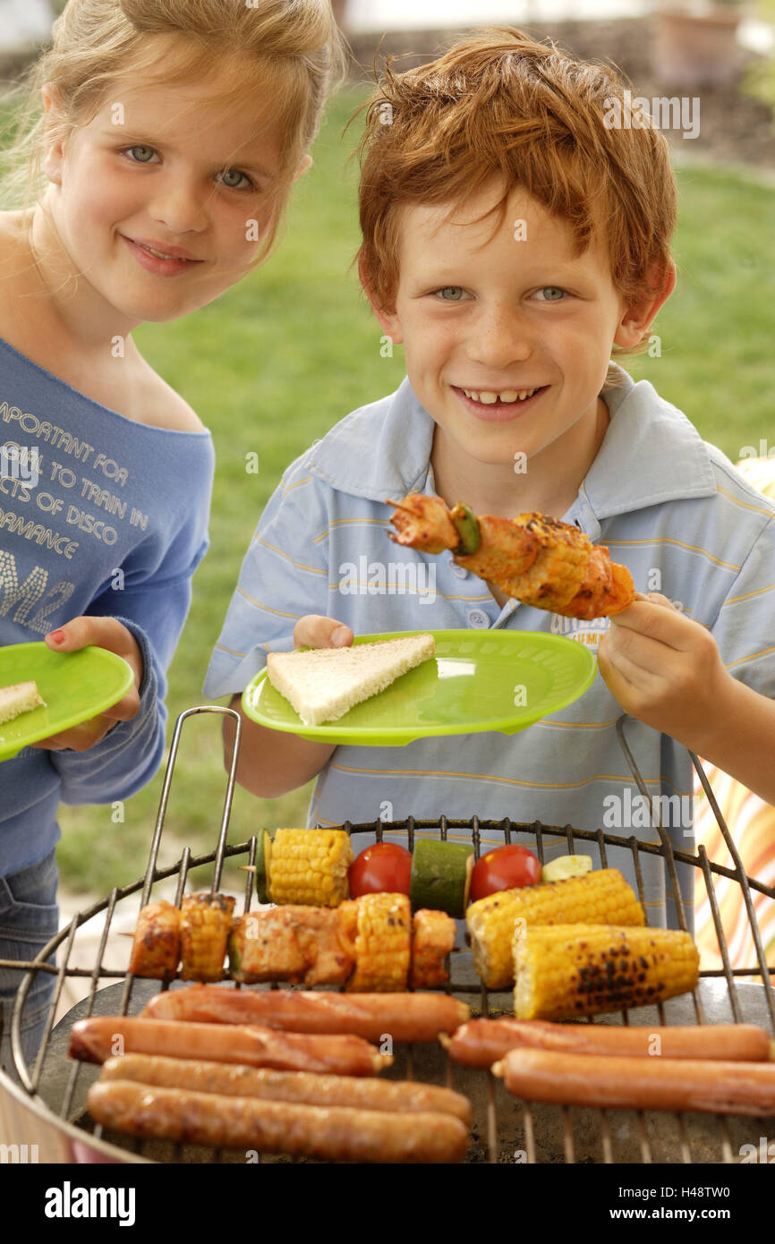 Children, garden, have of a barbecue, smile, view camera Stock Photo ...