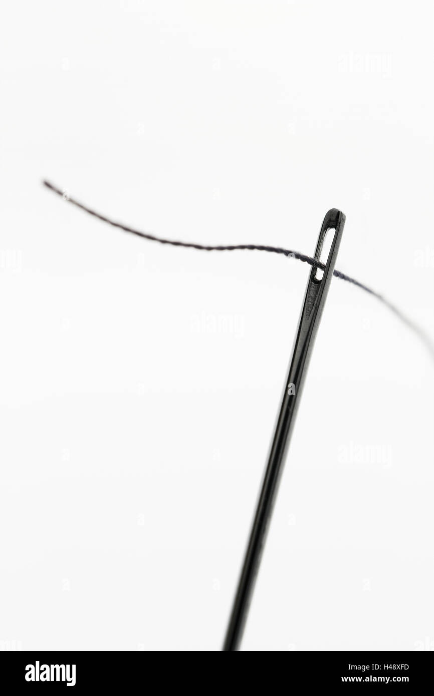 Needle and thread Stock Photo - Alamy