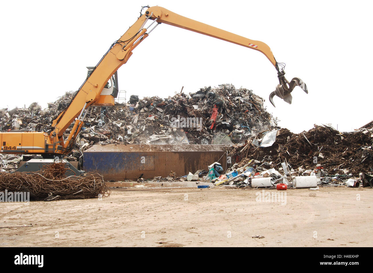 Scrap yard, scrap metal, excavator, claw arm, garbage waste dump, waste ...