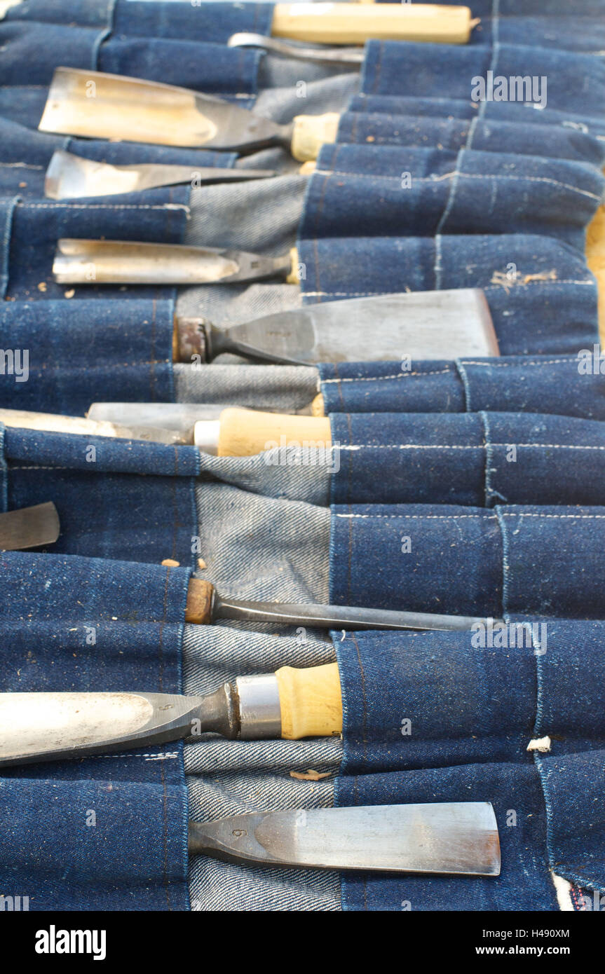 Carving tools in denim pouches, close-up Stock Photo - Alamy