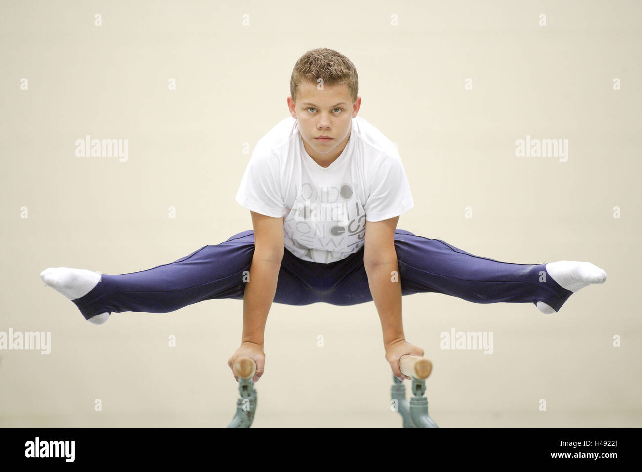 Young person, ingot, do gymnastics Stock Photo - Alamy