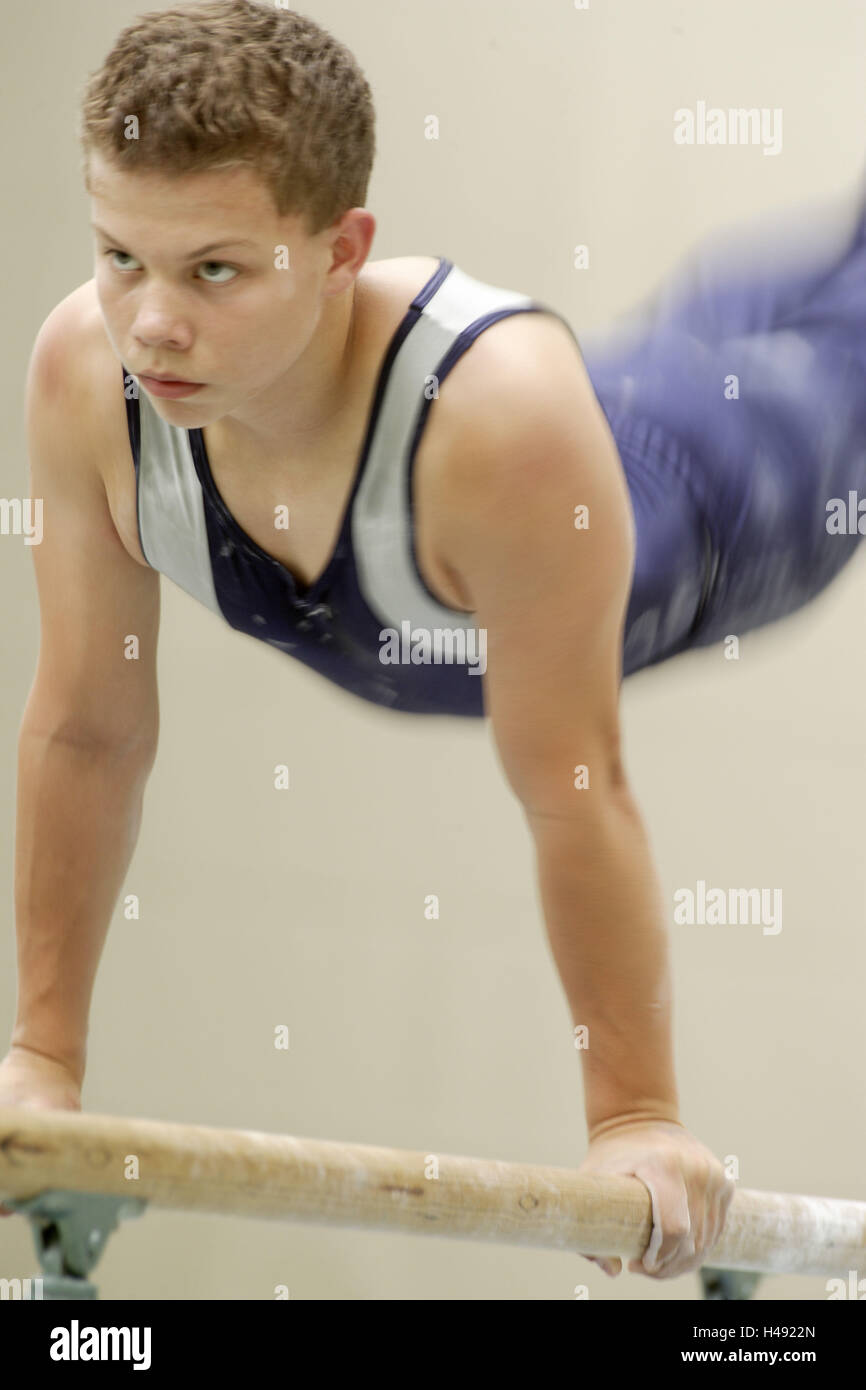 Young person, ingot, do gymnastics Stock Photo - Alamy