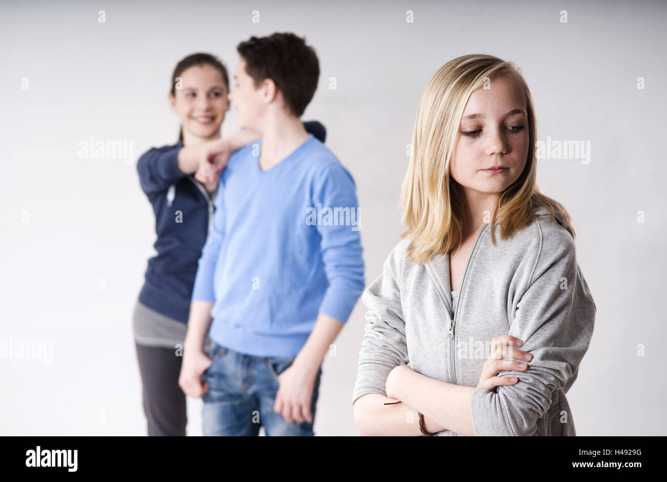 Teenage girls, boy, conversation Stock Photo - Alamy