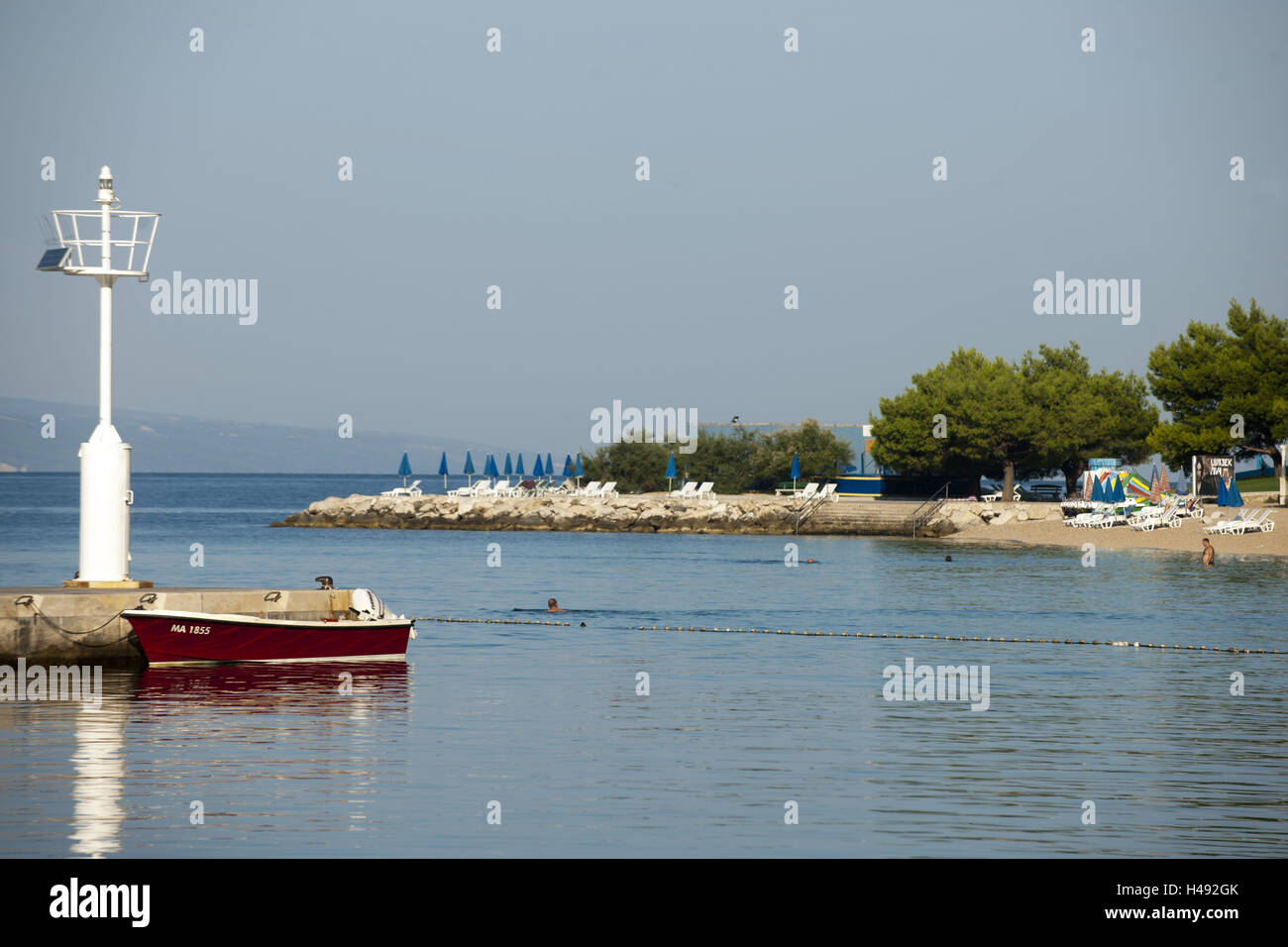 Croatia, Dalmatia, Makarska Riviera, Brela, view at harbour mole and ...