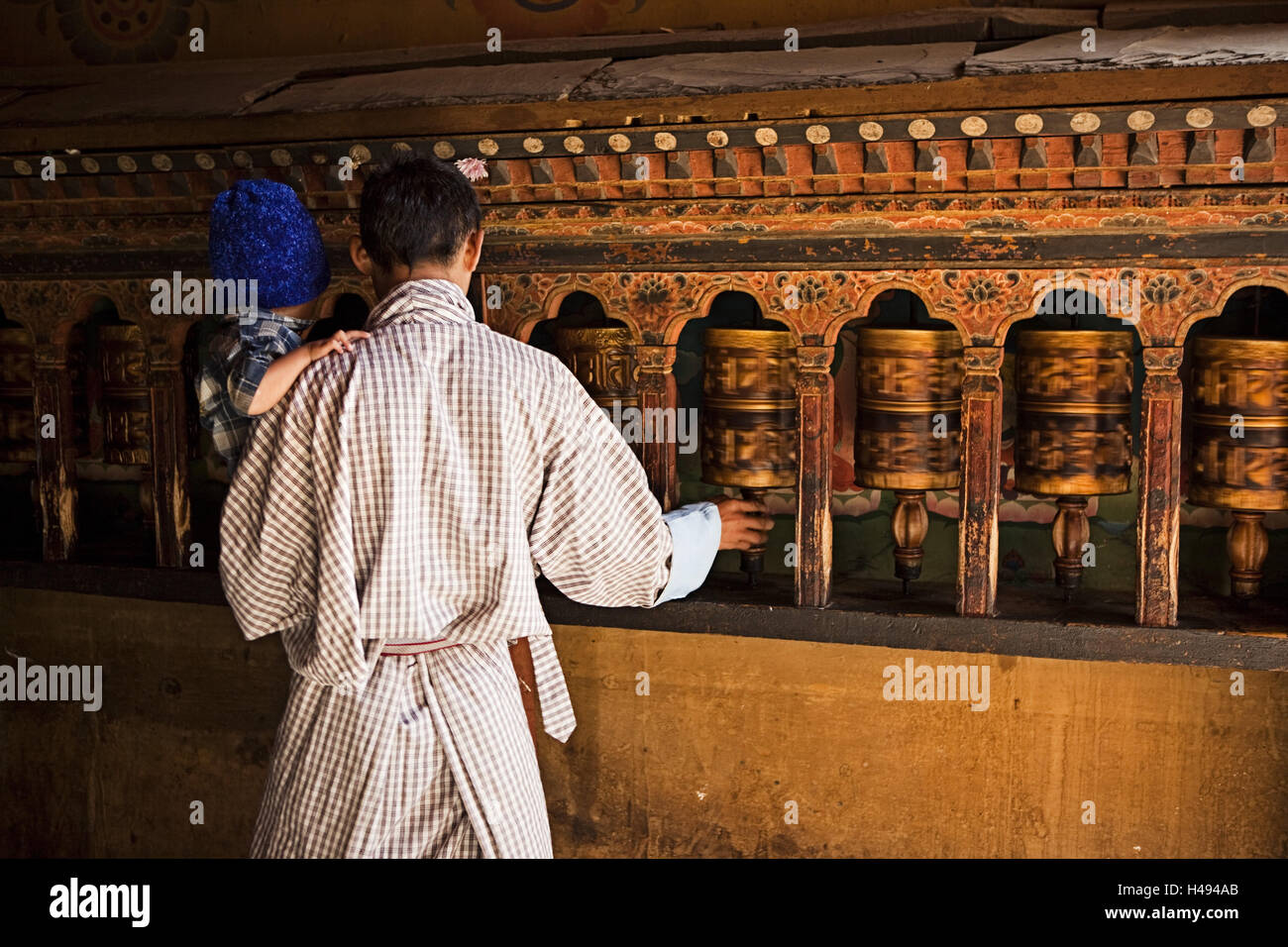 Buddhist man prayer wheel hi-res stock photography and images - Alamy