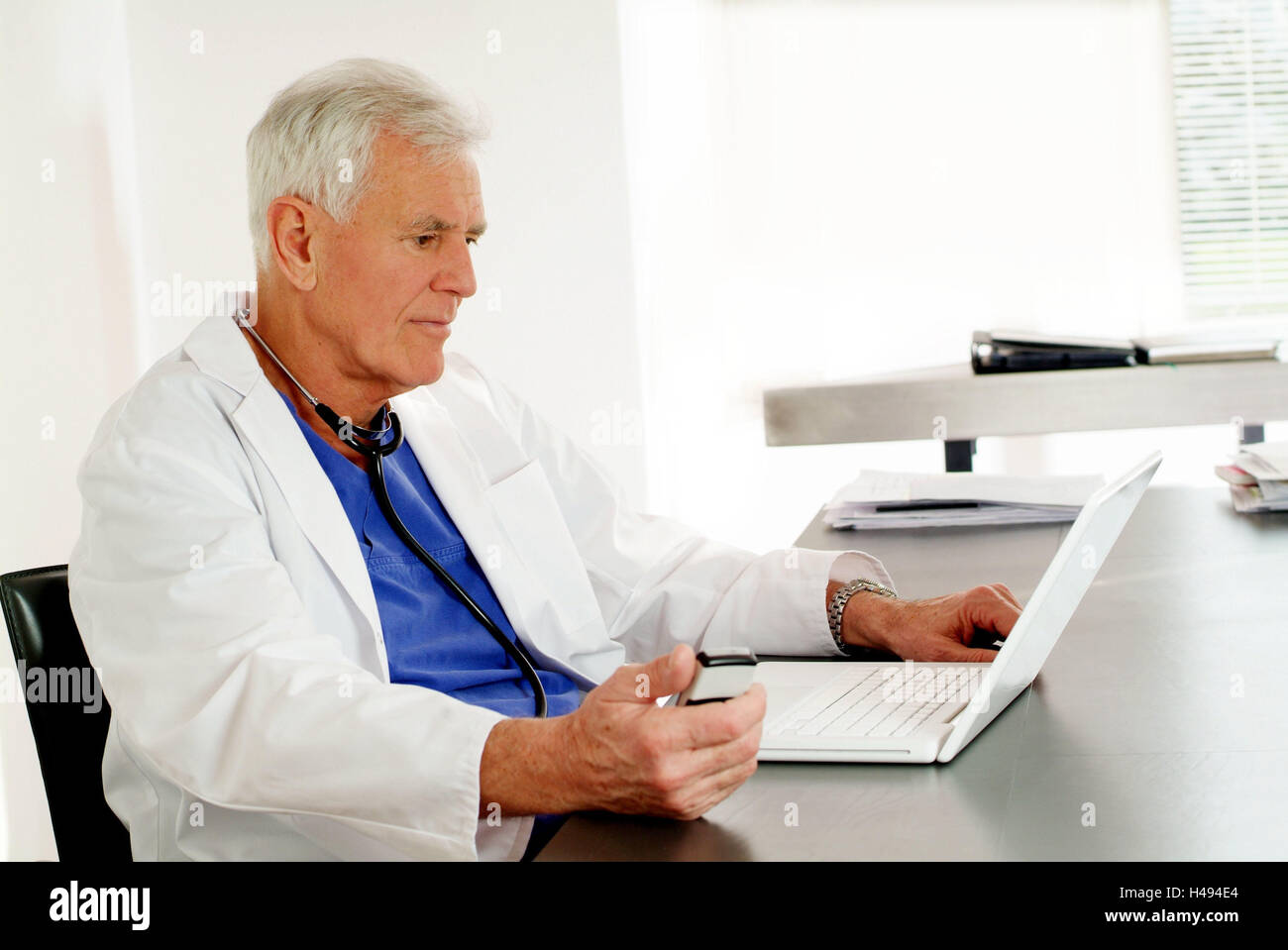 Speech room, doctor, laptop, dictaphone, side view, practise, medicine ...