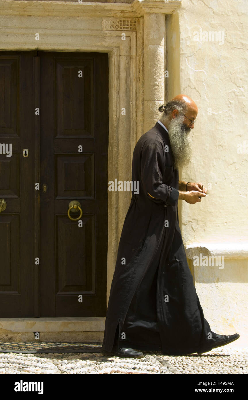 Greece, Crete, Makrigialos, monk in of the cloister Kapsa Stock Photo ...