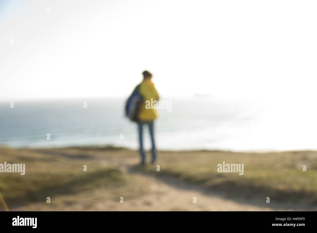 Woman walking back view blur alone hi-res stock photography and images ...