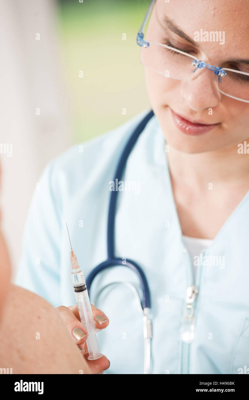 Senior man is getting an injection from young doctor Stock Photo - Alamy