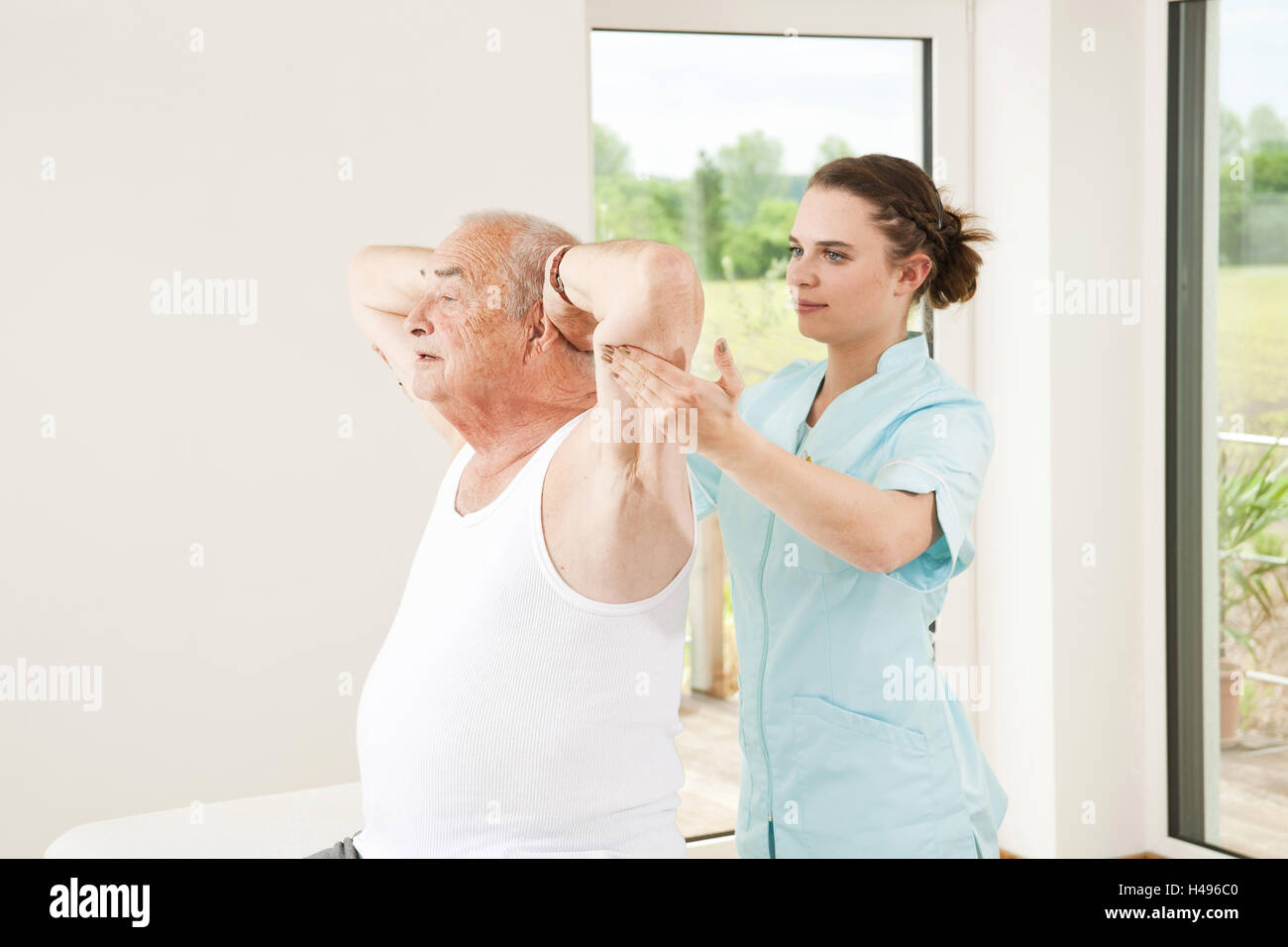 Senior man at physiotherapy Stock Photo - Alamy