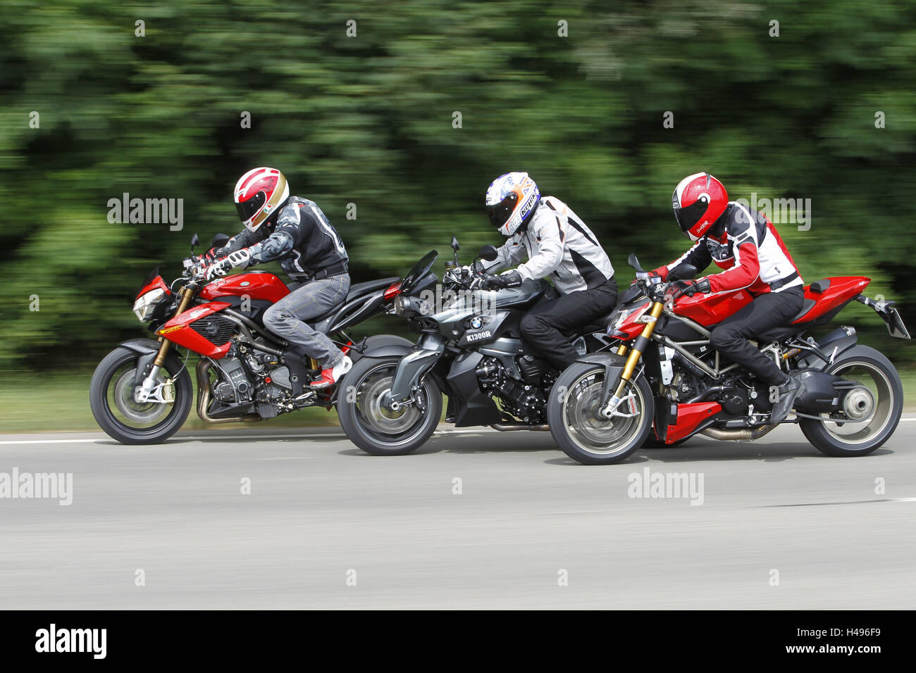 Motorcyclist, motorcycle, dolly shot, fun bikes, 3rd group, panning in ...