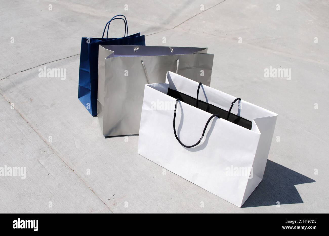 Purchasing bags, put down, pouches, bags, three, white, silver, blue ...