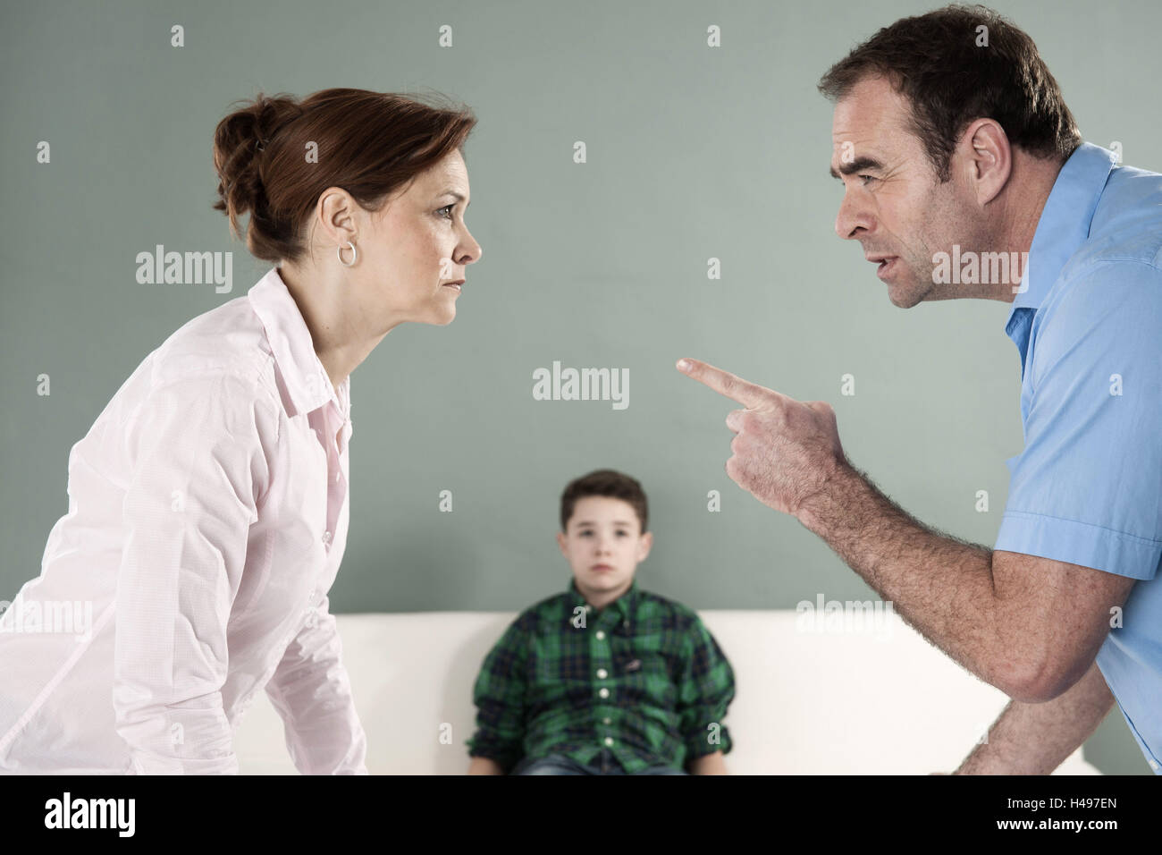 Mother and father argue in front of her child Stock Photo - Alamy