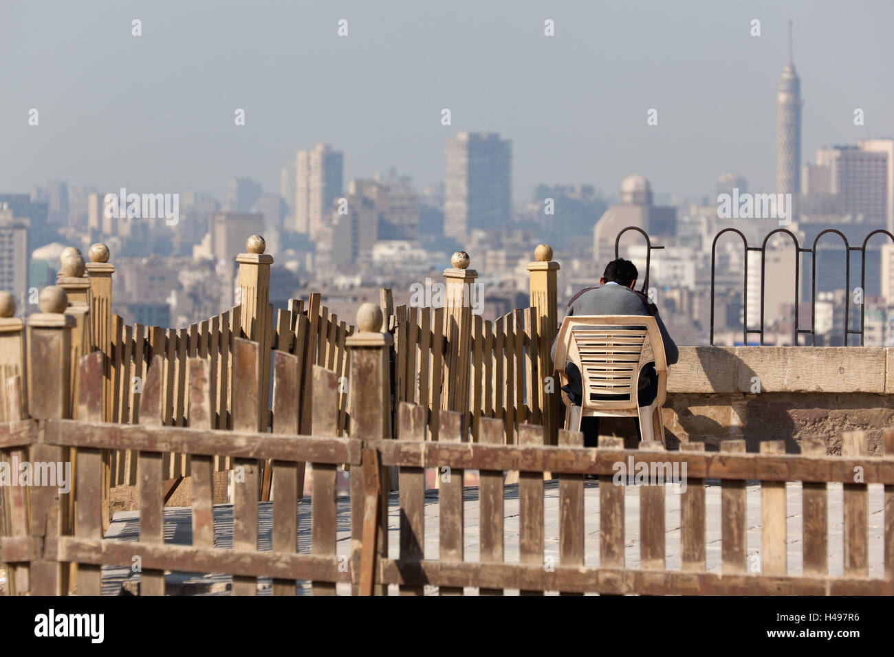 Egypt, Cairo, citadel, terrace, fence, man on chair Stock Photo - Alamy
