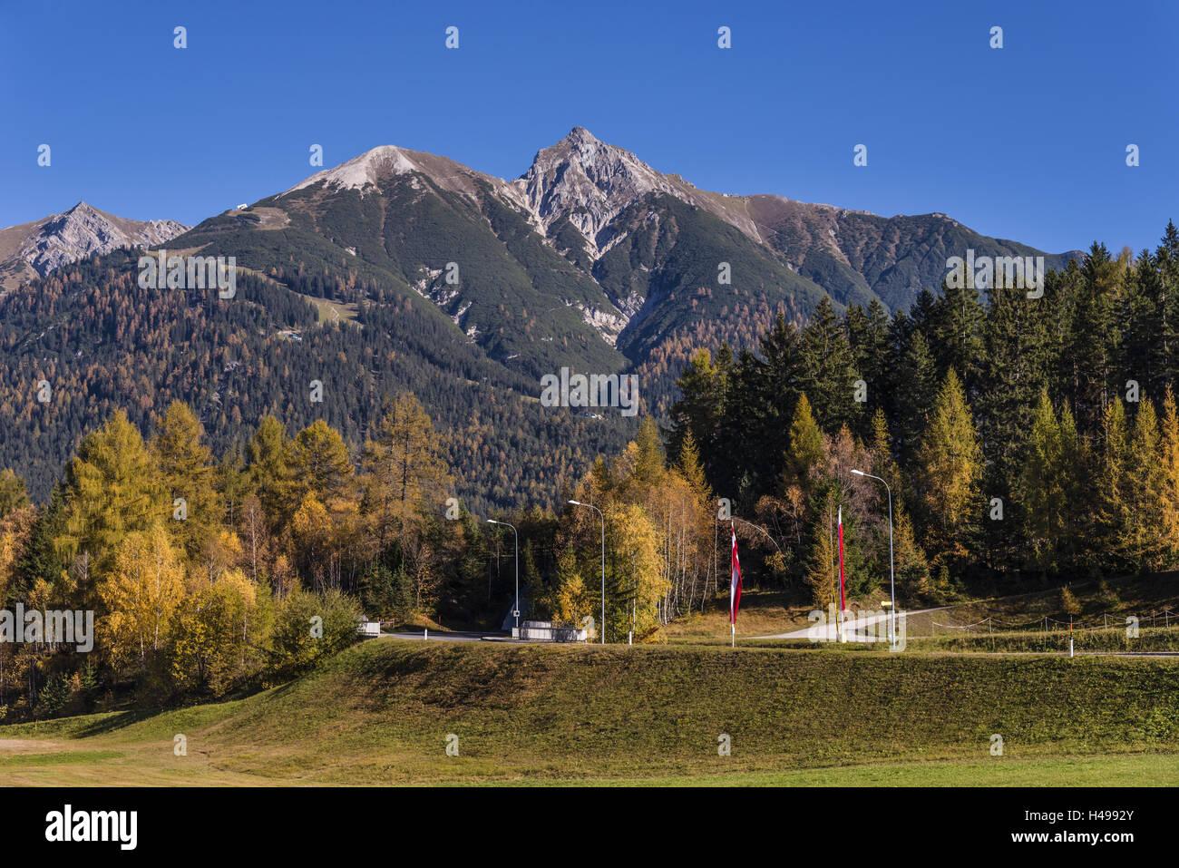 Austria, Tyrol, sea fields Col, Sea field, Autumn wood against Reither ...