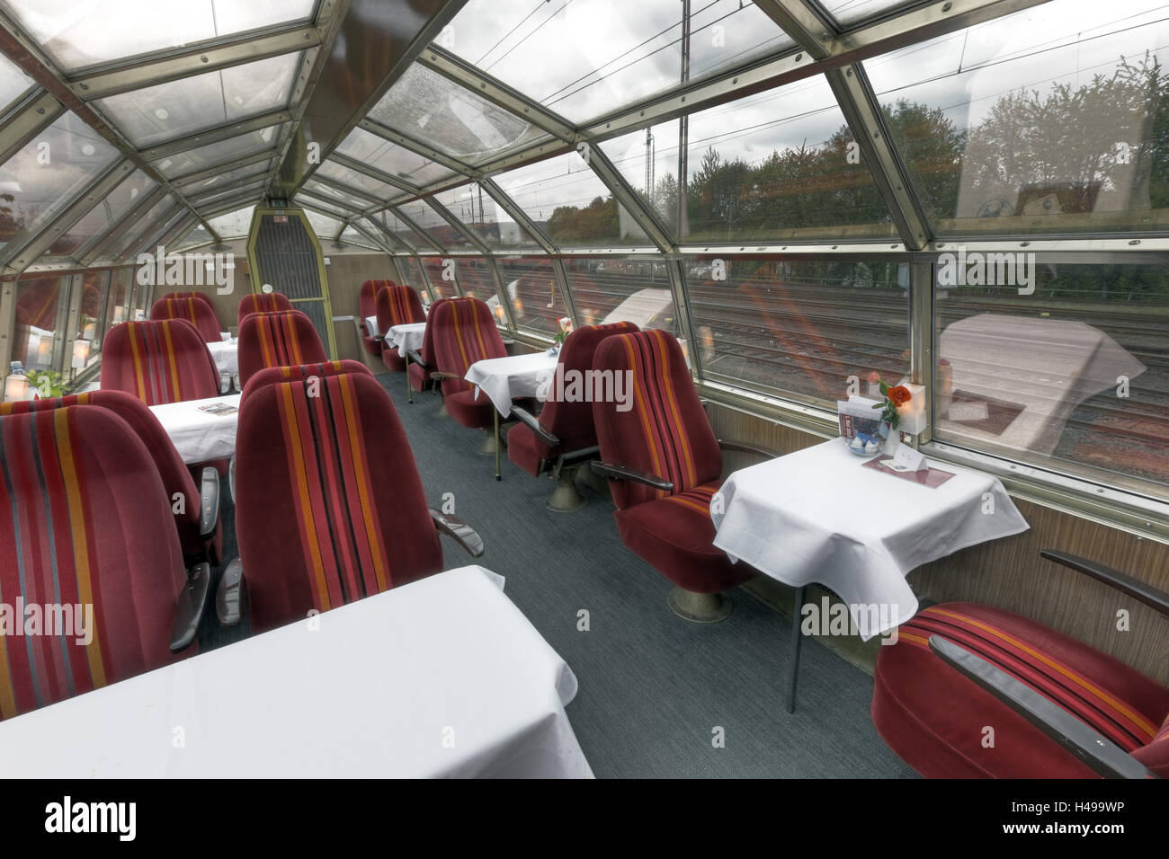 Panoramic train, glass dome, seats, tables Stock Photo - Alamy