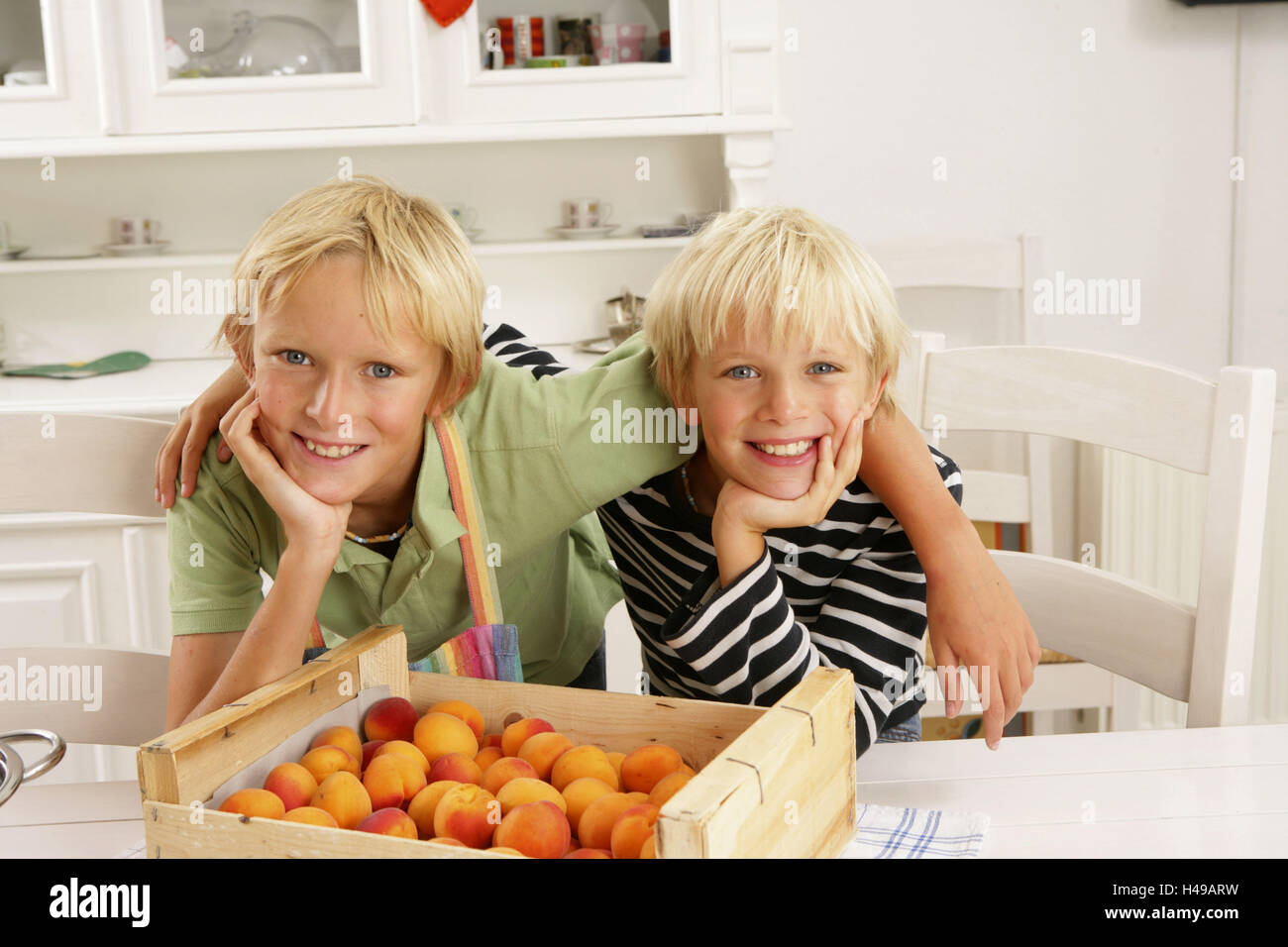 Children, kitchen, happy, smiles, apricots Stock Photo - Alamy