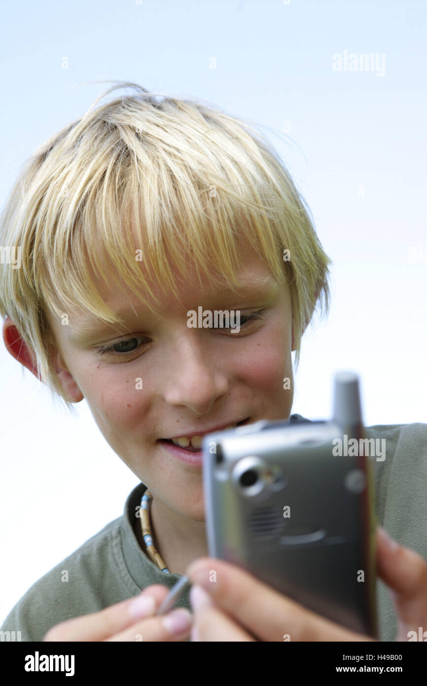 Boy, mobile phone, display, look, smile Stock Photo - Alamy