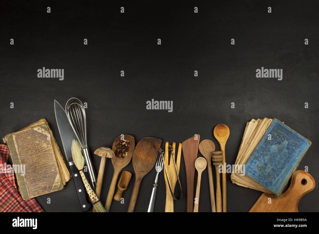 Kitchen utensils on wooden table. Tools cook. Needs to cook. Set of the ...