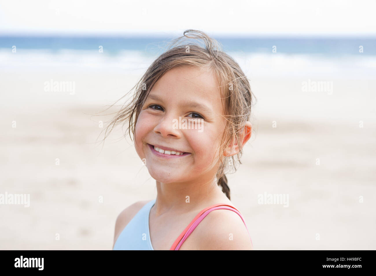 Girl on the beach, portrait Stock Photo - Alamy