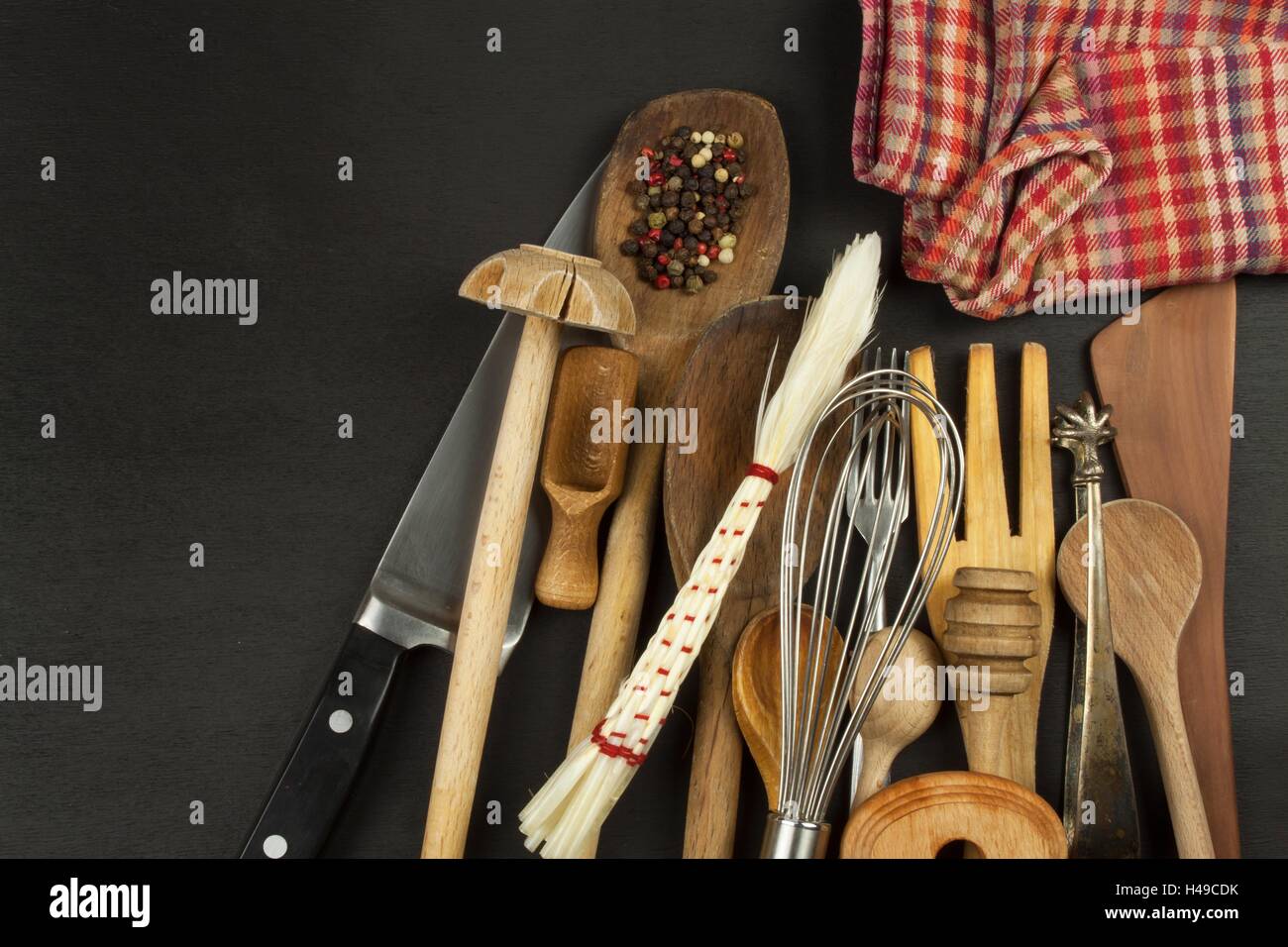 Kitchen utensils on wooden table. Tools cook. Needs to cook. Set of the ...