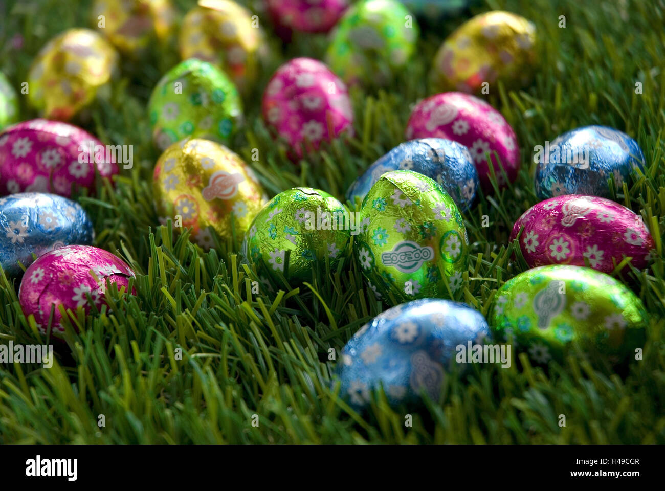 Grass, chocolate Easter eggs, brightly, medium close-up Stock Photo - Alamy