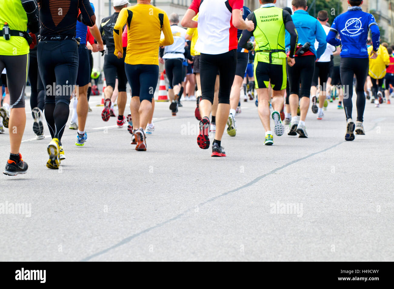 Legs of marathon runners Stock Photo - Alamy