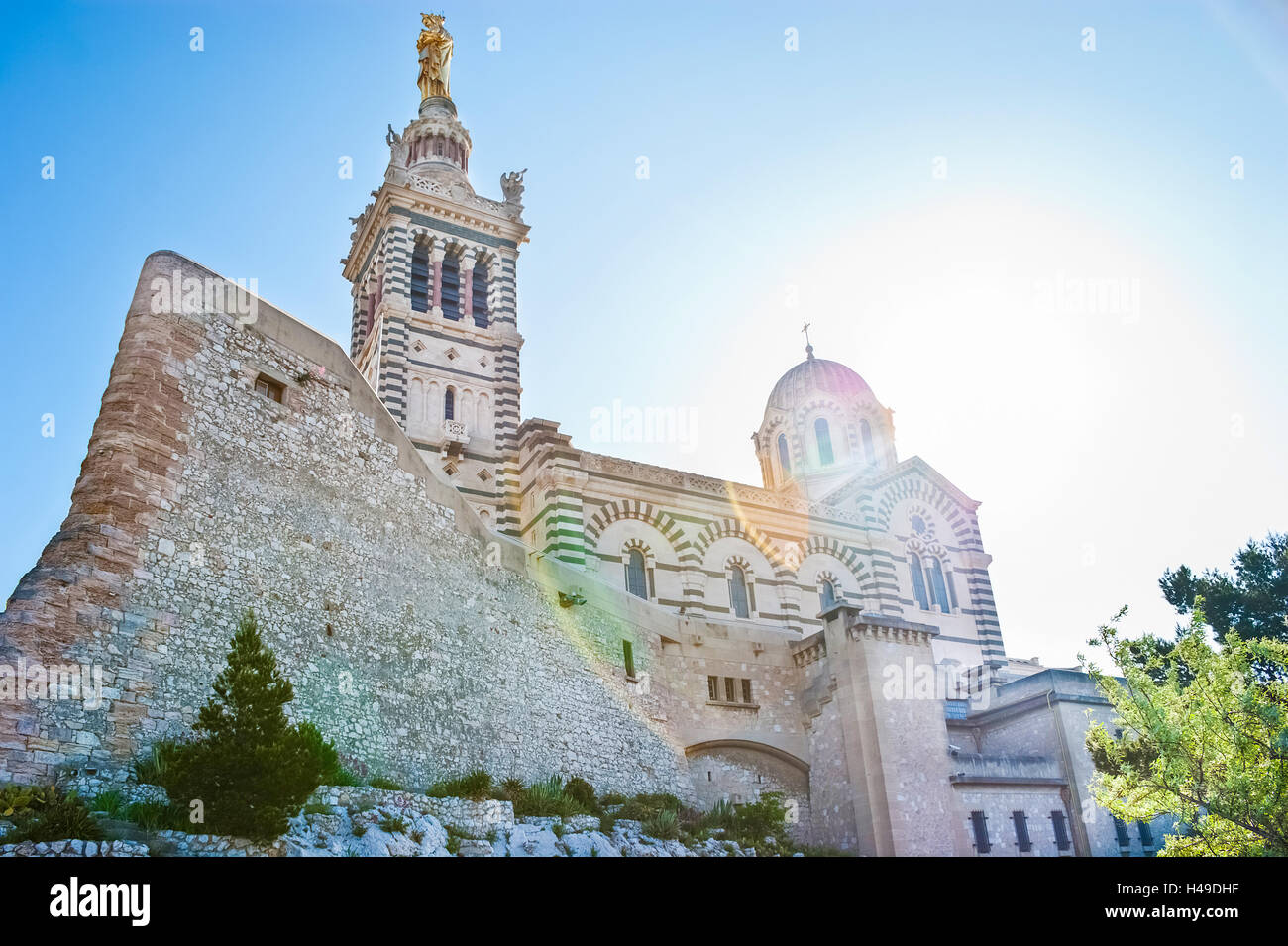 The great neo-byzantine architecture of the Notre-Dame de la Garde with ...