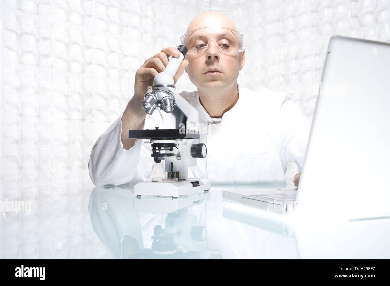 Laboratory, scientist, serious, microscope, laptop, focused, research ...