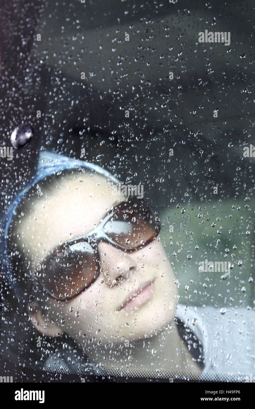 Girls, sun glasses, gaze, car window, raindrops, model released Stock ...