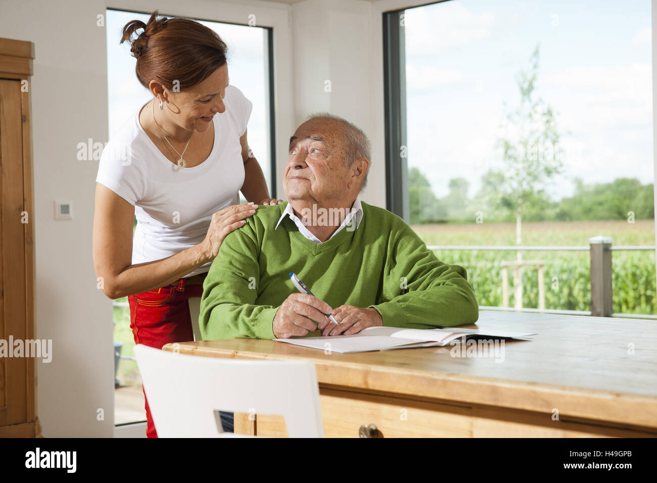 Senior man looks after advance decision Stock Photo - Alamy