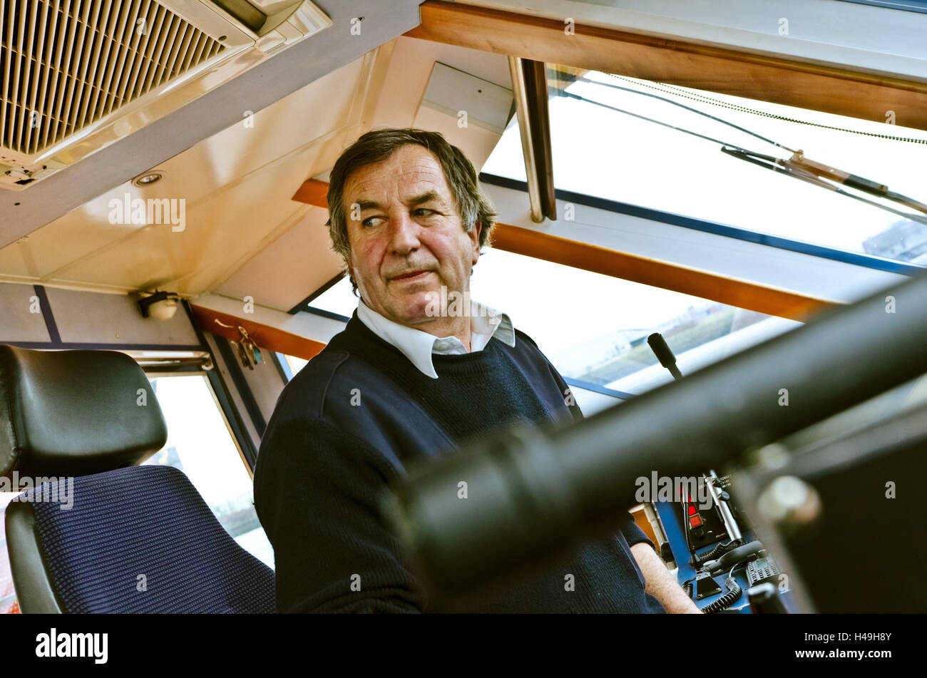 Captain of ferry hi-res stock photography and images - Alamy