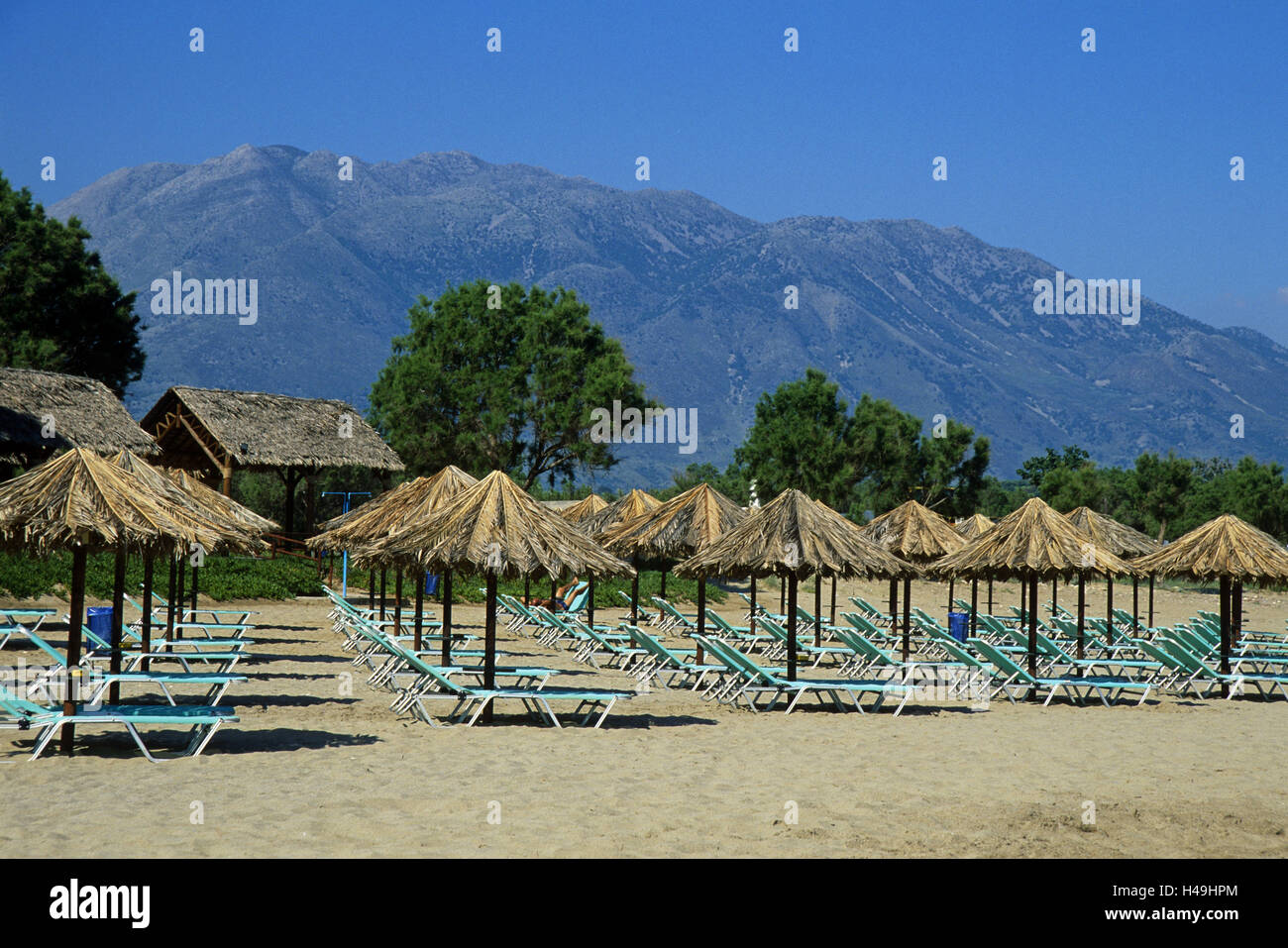 Greece, Crete, Episkopi, beach, sunshades, deck chairs, mountains Stock ...