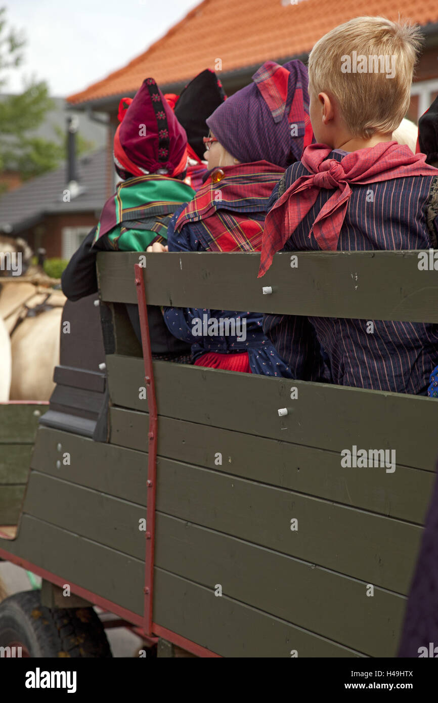 Carriage, children, traditional costumes, procession, public festival ...