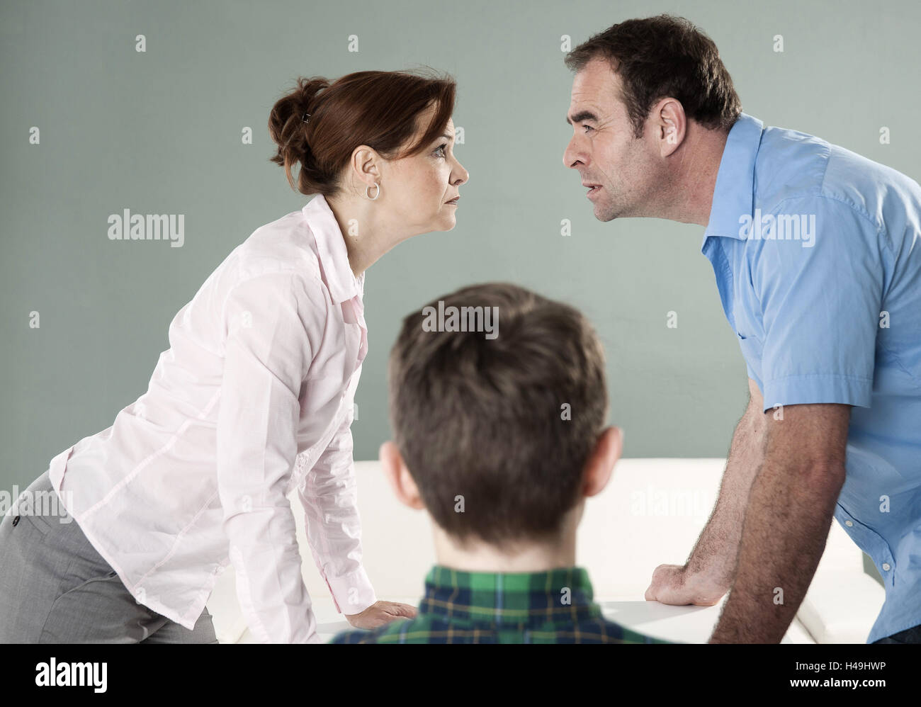 Mother and father argue before her child Stock Photo - Alamy