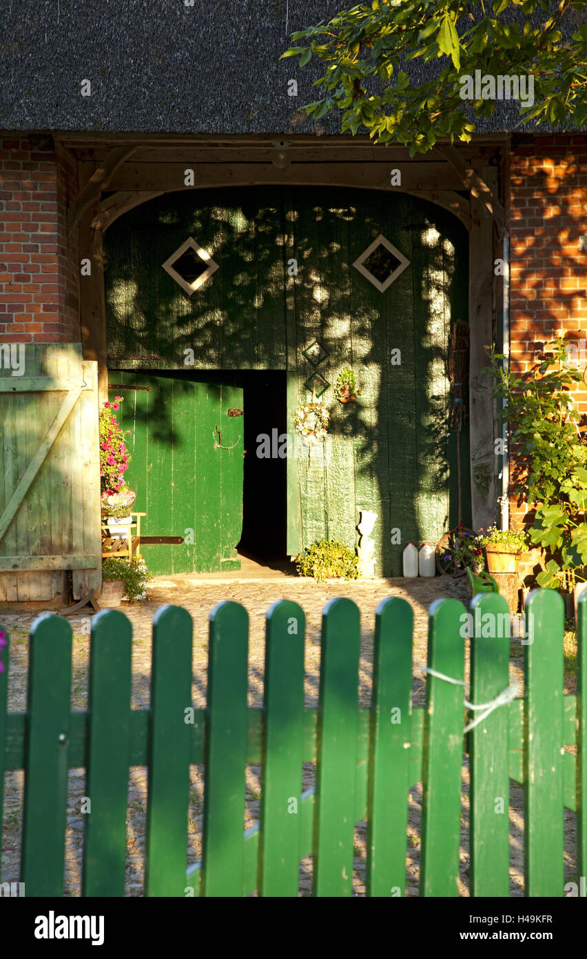 Farmhouse, fence, thatched roof Stock Photo - Alamy
