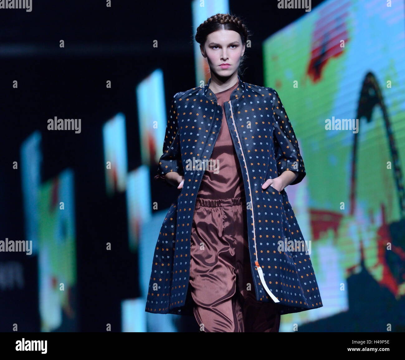 Zagreb, Croatia. 13th Oct, 2016. A model presents a creation during the ...