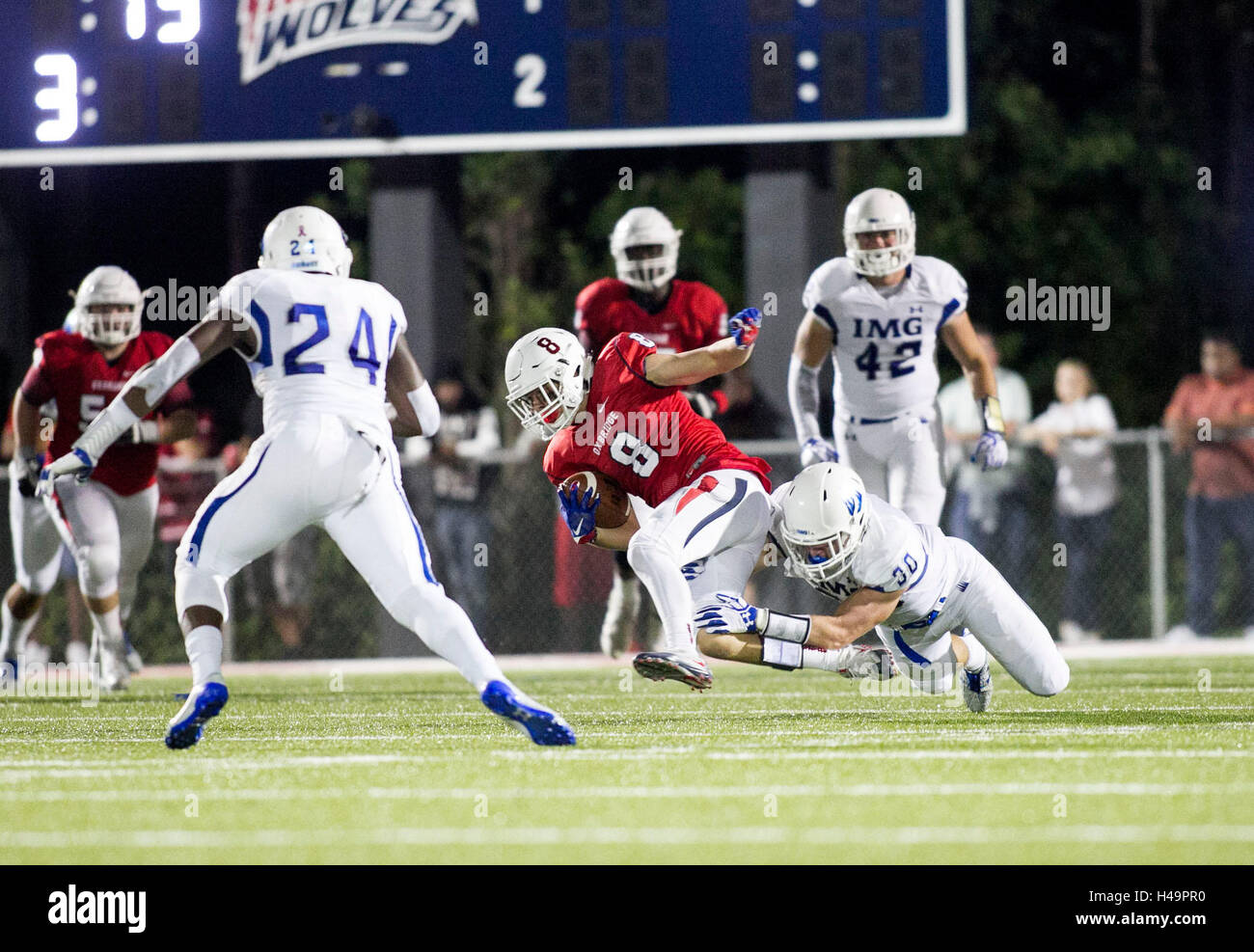 Florida, USA. 13th Oct, 2016. Oxbridge #8 Cade Socha tackled by ...