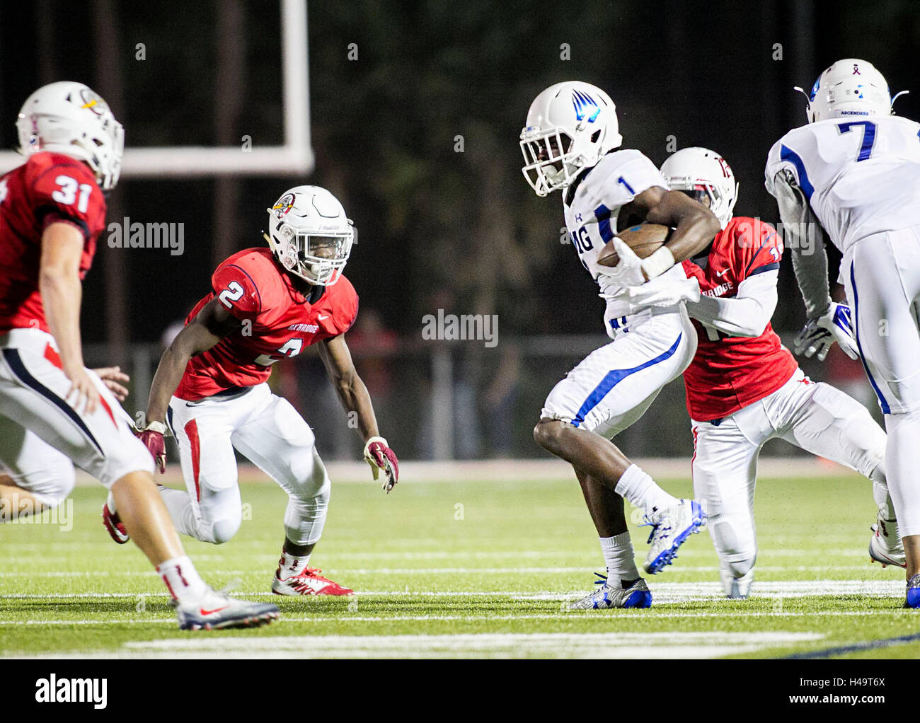 Florida, USA. 13th Oct, 2016. Oxbridge #12 Keidron Smith tackles ...